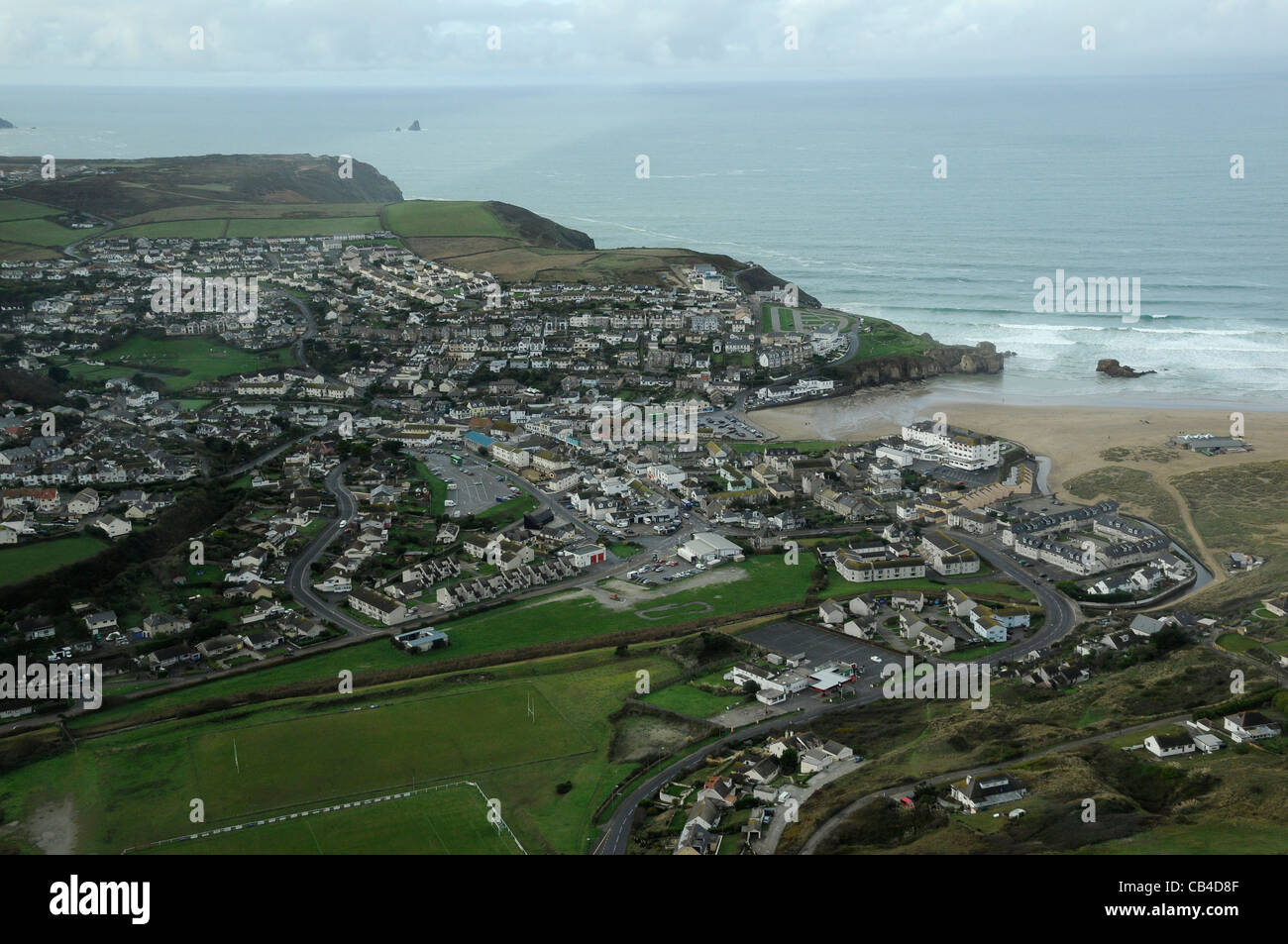 The small town of Perranporth sits behind the cliffs at the south end ...