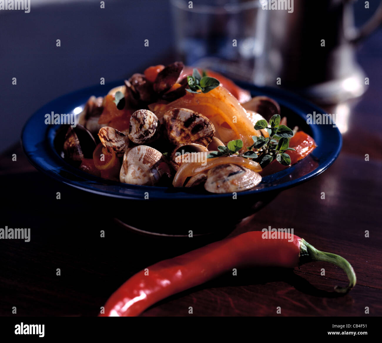 Clam shells with tomato sauce Stock Photo - Alamy