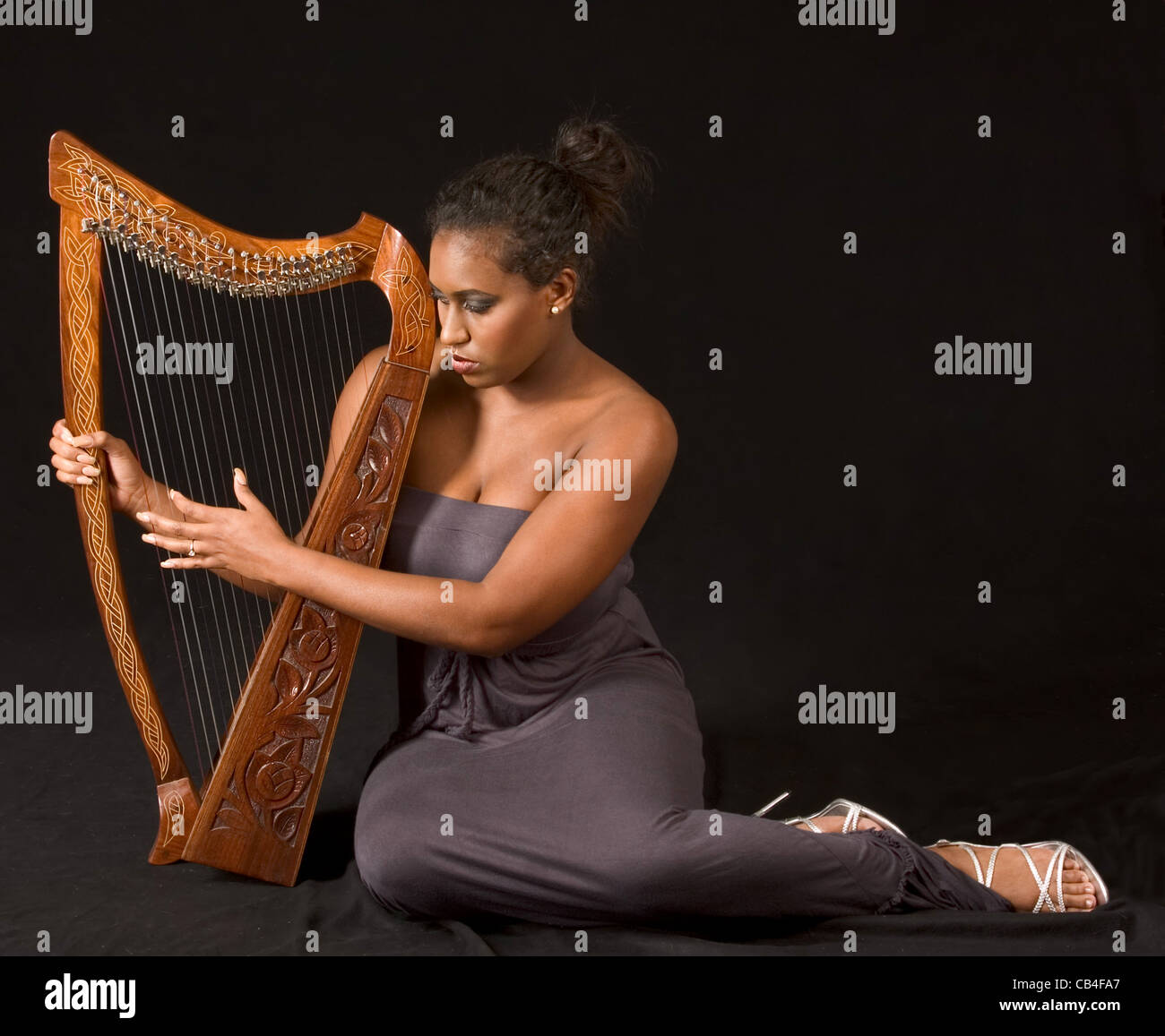 Female woman girl harpist harp playing hi-res stock photography and ...