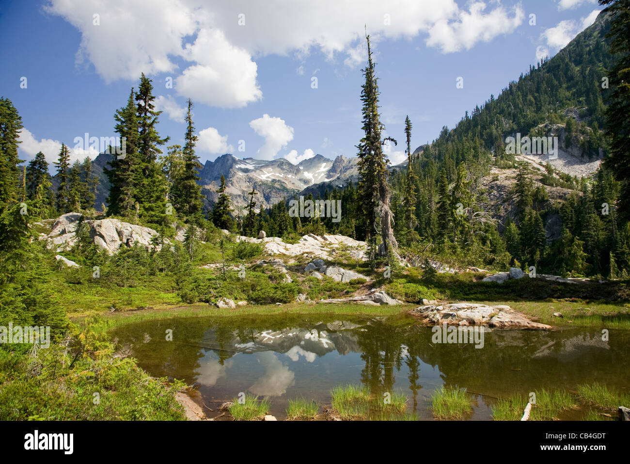 WASHINGTON - Mount Daniel reflecting in a small pond above Spade Lake ...