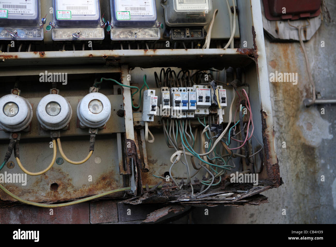 Unsafe messy unregulated mains power connections, street central Xiamen ...