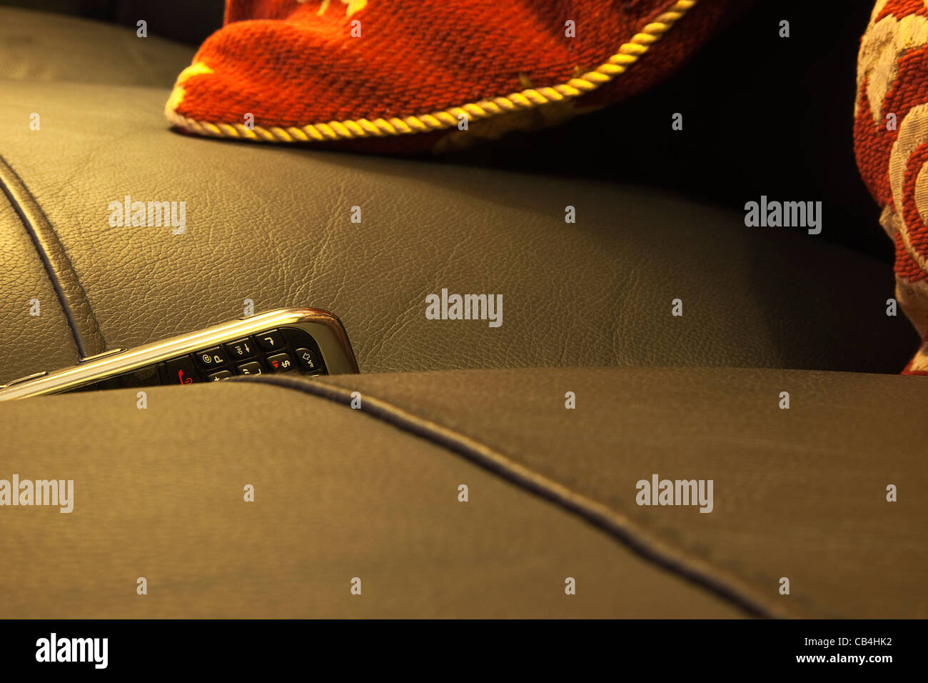 Phone lost between sofa cushions hi-res stock photography and images ...