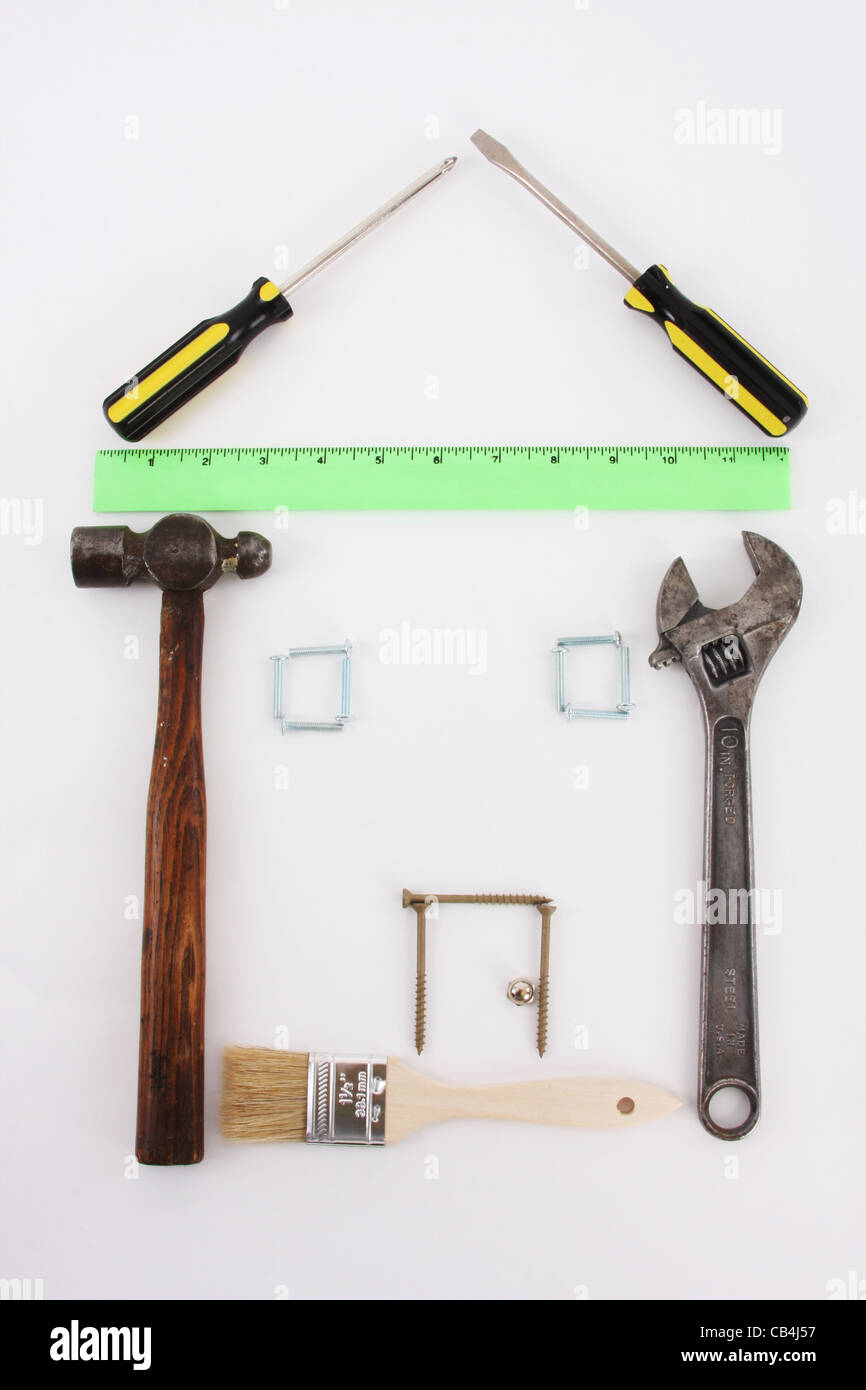 A house shaped symbol made up of household tools Stock Photo - Alamy