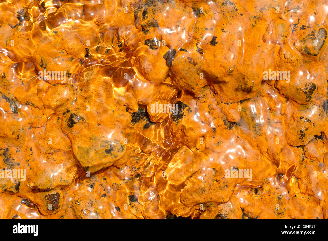 Orange Iron Oxide Sediments On Rocks Near Tungurahua Volcano Ecuador ...