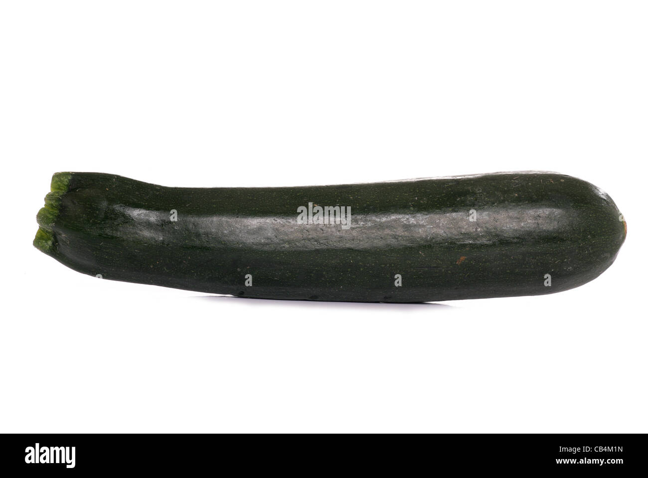 Courgette on a white background Stock Photo - Alamy