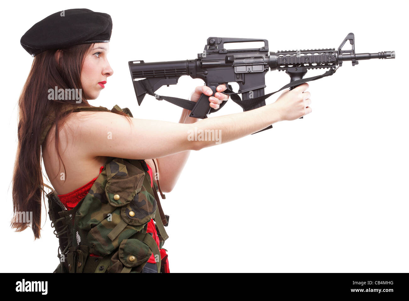 Sexy women - Girl holding an Assault Rifle, isolated Stock Photo - Alamy