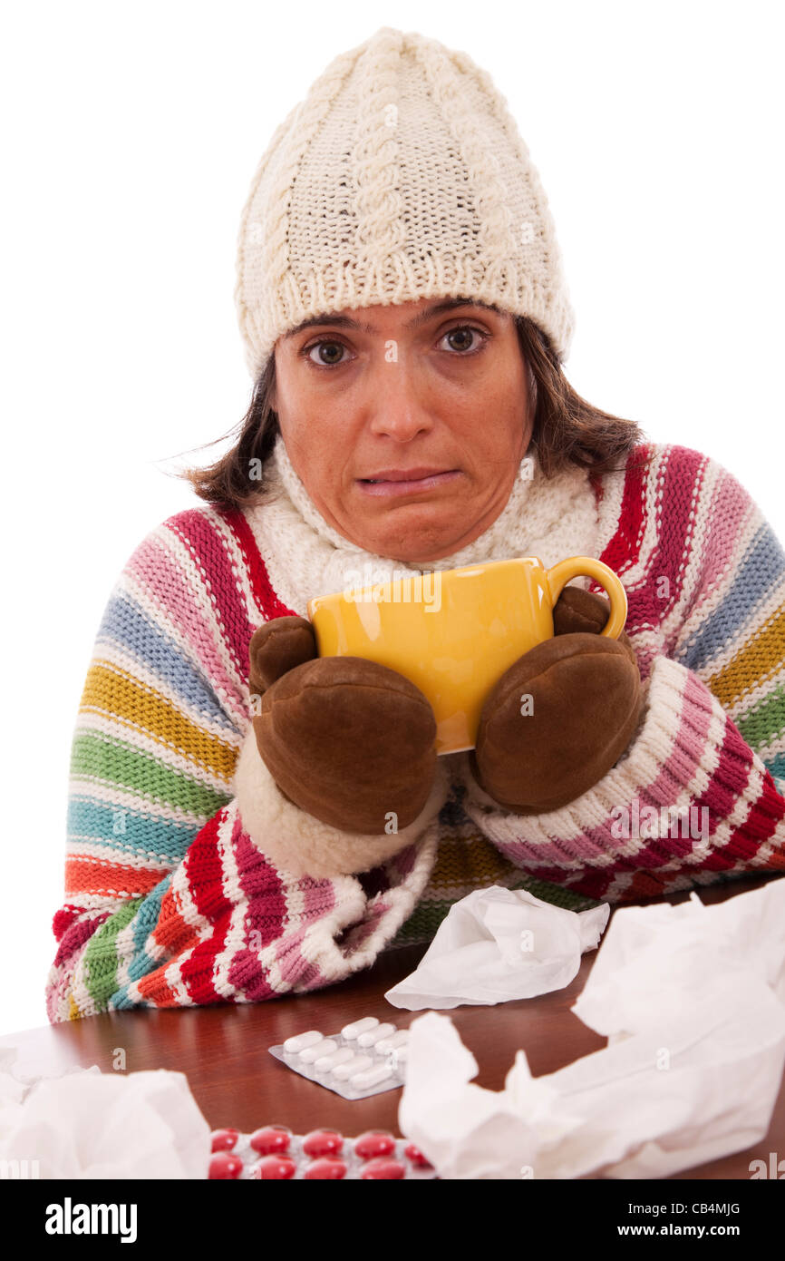 sad woman with flu symptom holding a mug with a hot drink (isolated on ...