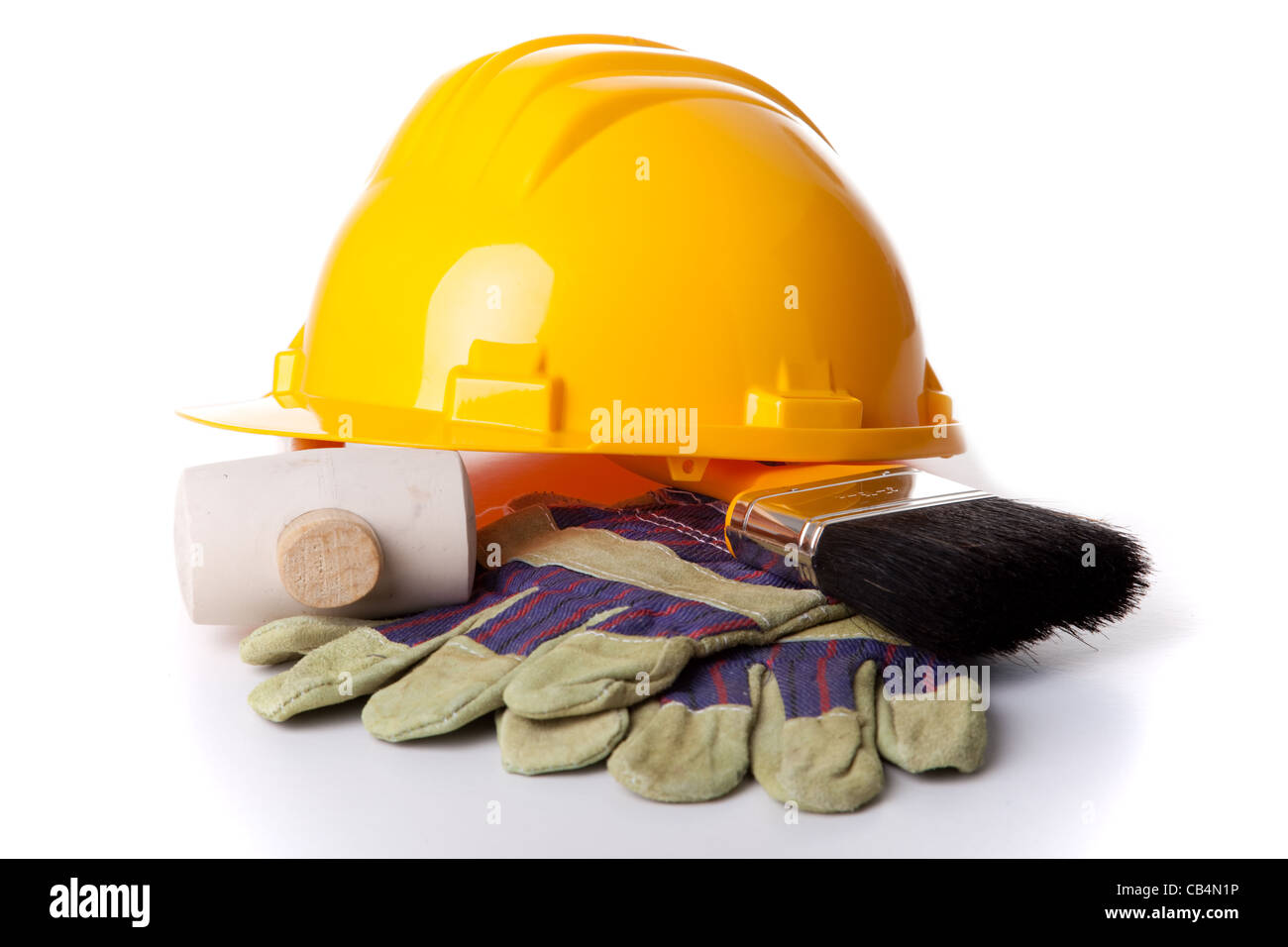 mix of protection and working construction tools over a white ...