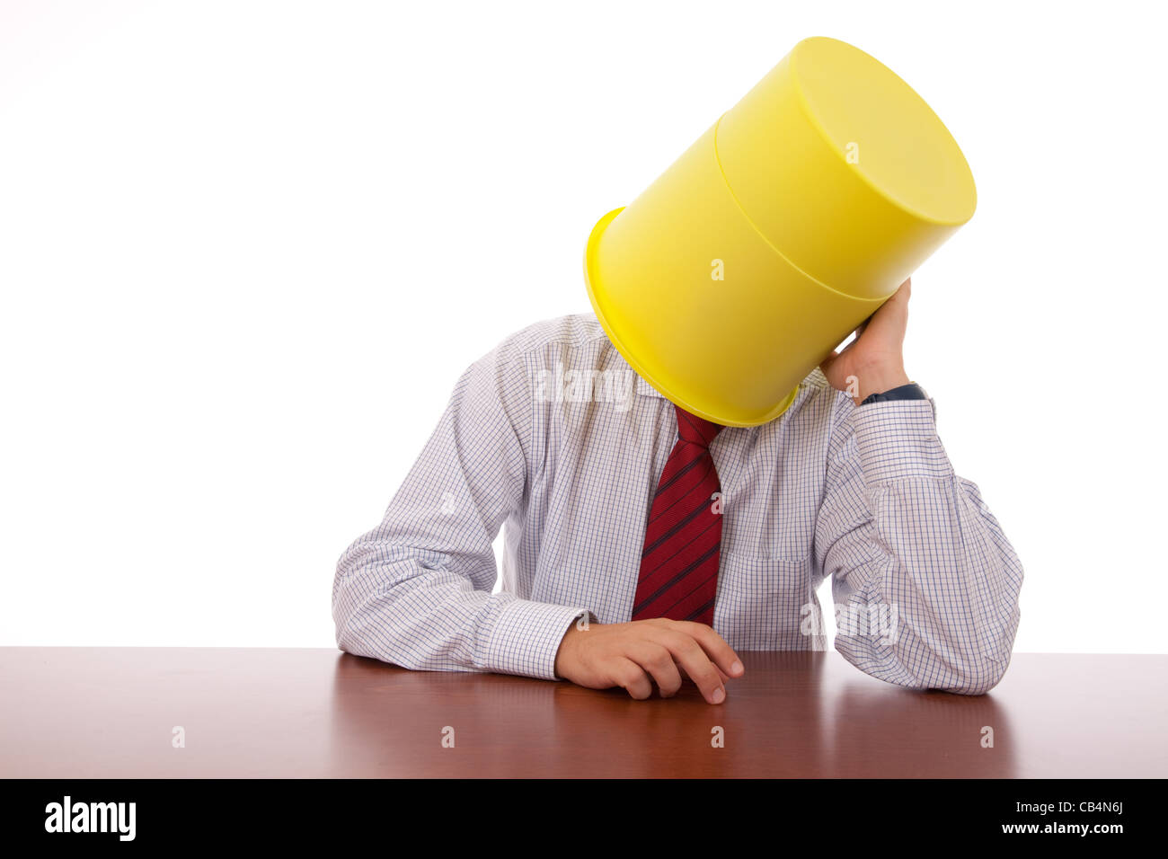 businessman with a bucket on his head Stock Photo - Alamy