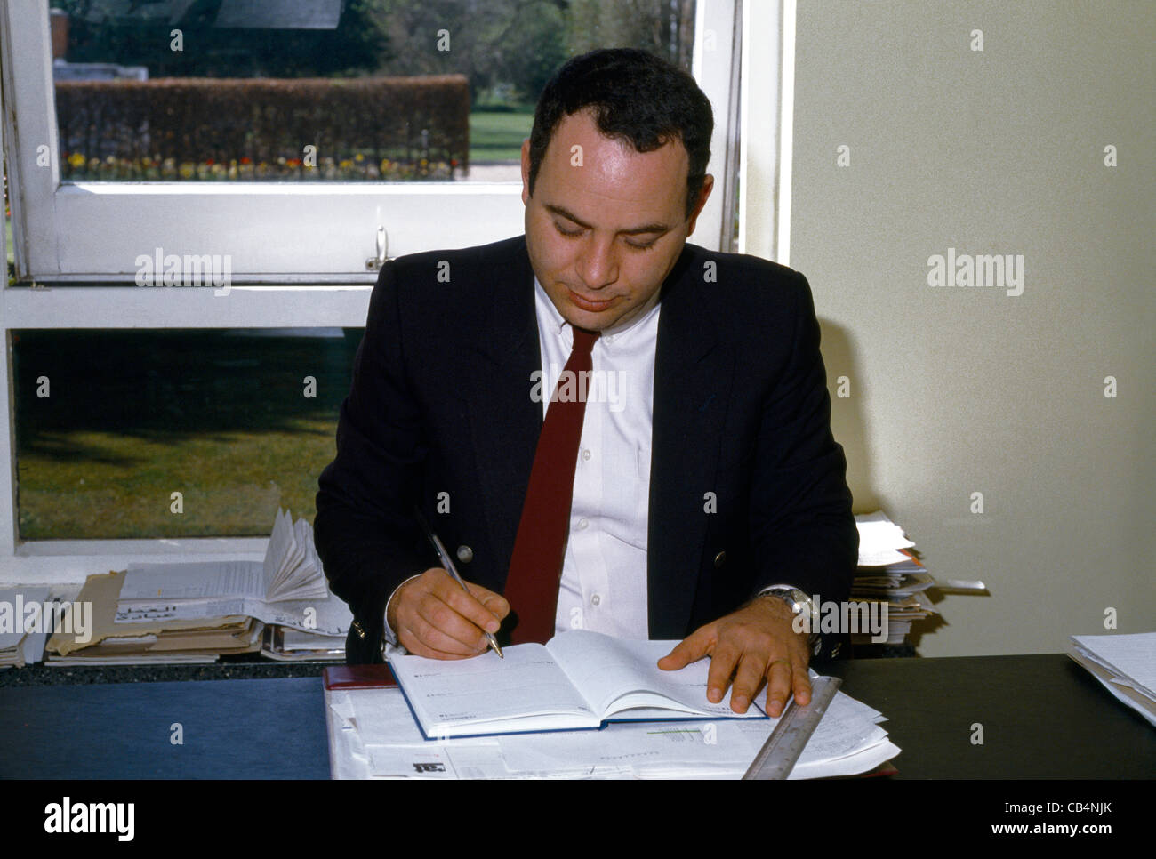 Journalist Writing In Diary Stock Photo - Alamy