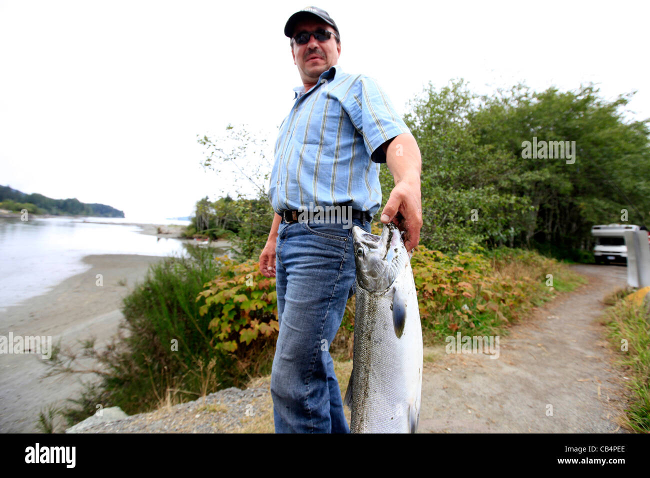 Salmon fisher in the Pacheena Indian Reserve Stock Photo - Alamy