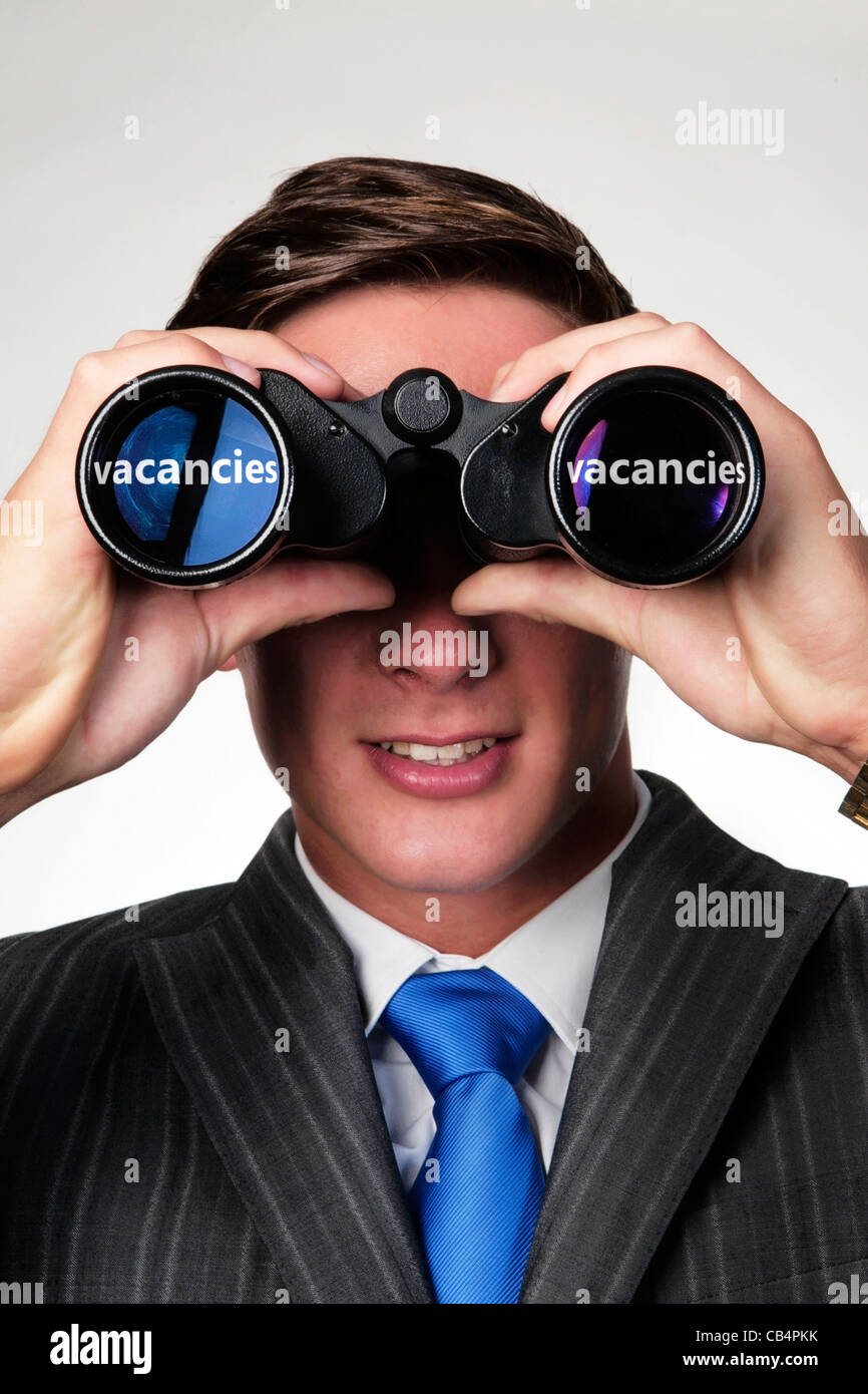 business man searching with binoculars Stock Photo - Alamy