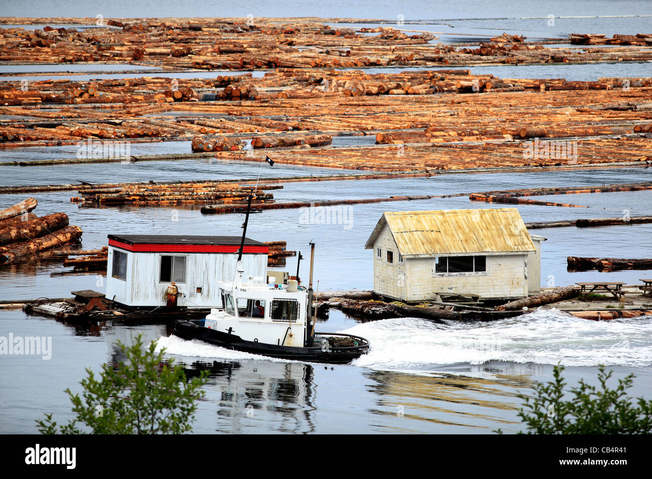Small log tugboat, Telegraph Cove Stock Photo - Alamy