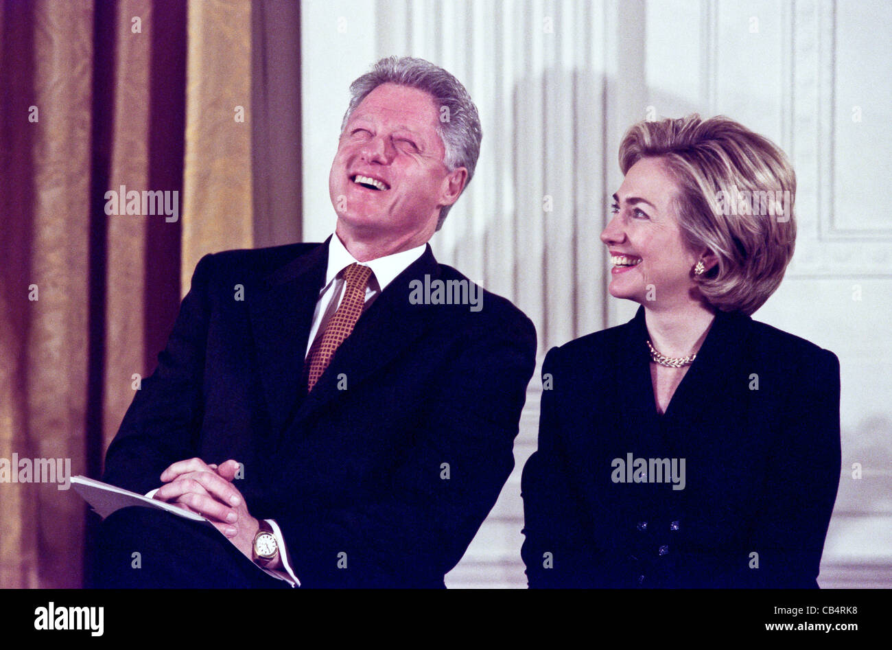 US President Bill Clinton and First Lady Hillary Clinton laugh after ...