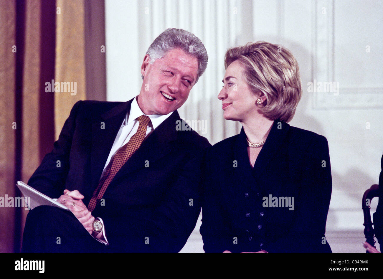 US President Bill Clinton and First Lady Hillary Clinton laugh after ...