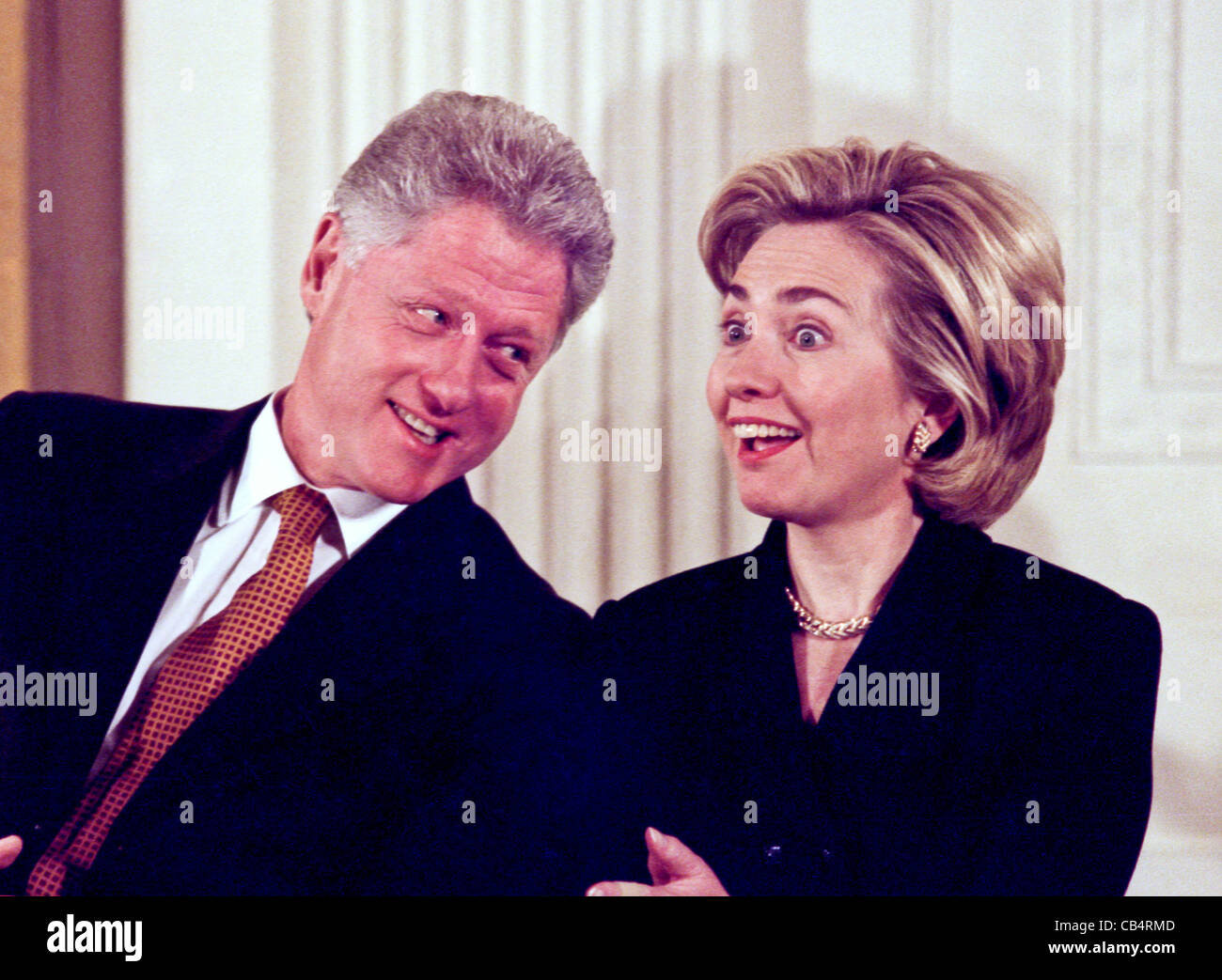 US President Bill Clinton and First Lady Hillary Clinton laugh after ...