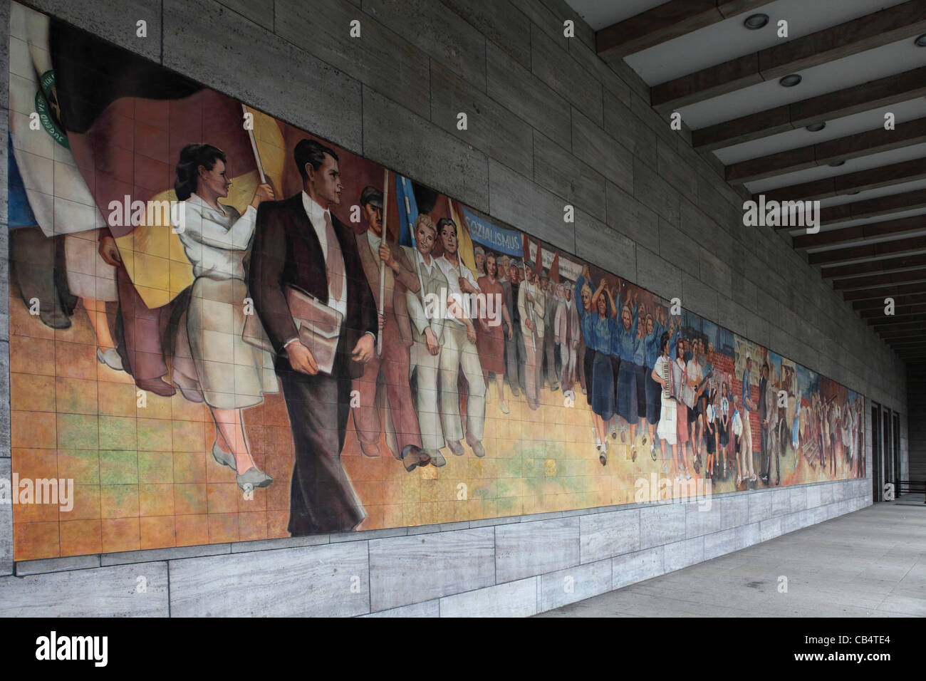 Socialist mural in Berlin, Germany Stock Photo - Alamy