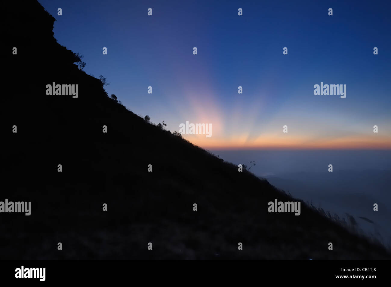Sunrise with red rays Stock Photo - Alamy