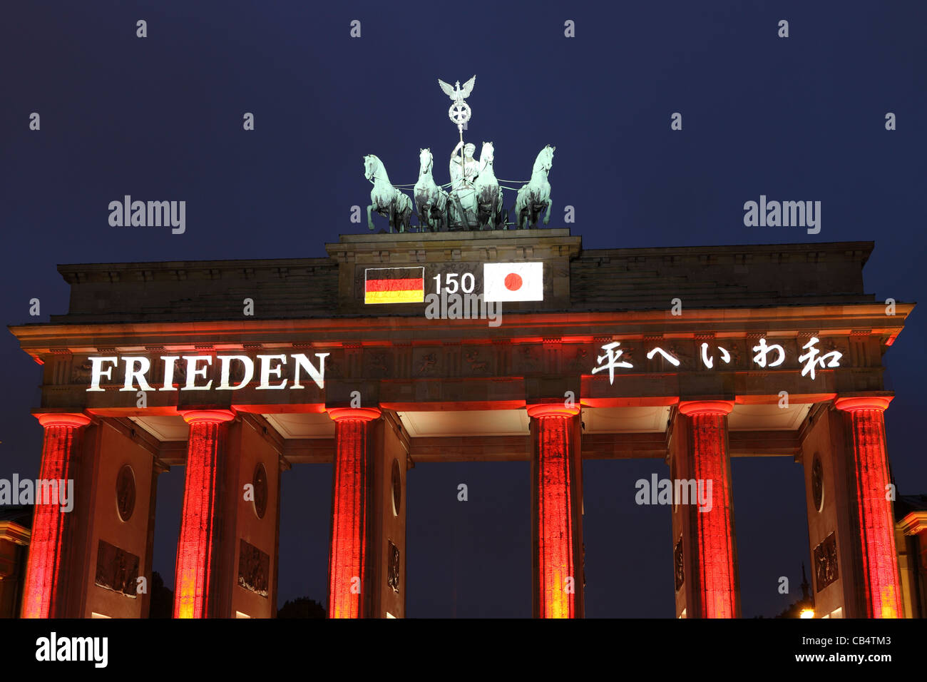 The words for Peace in German and Japanese are projected onto the ...