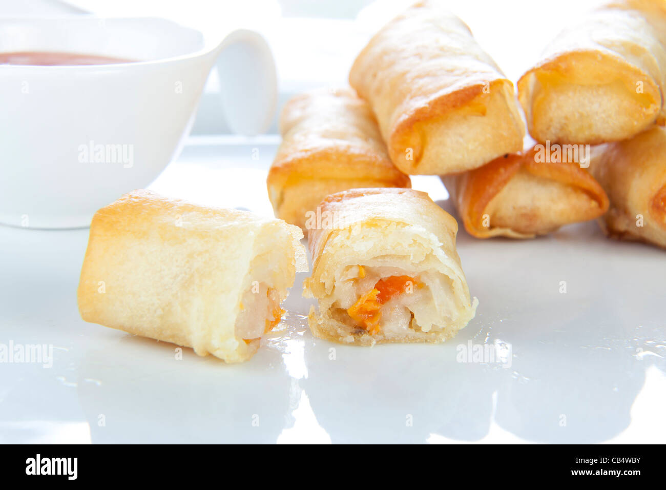 Freshly prepared Asian spring rolls appetizer Stock Photo - Alamy