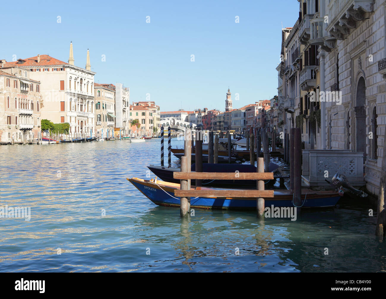 A view down the Grand Canal in Venice, Italy, with moorings for boats ...