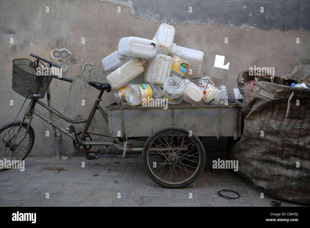 Tricycle used by migrant worker to collect recycled recyclable ...