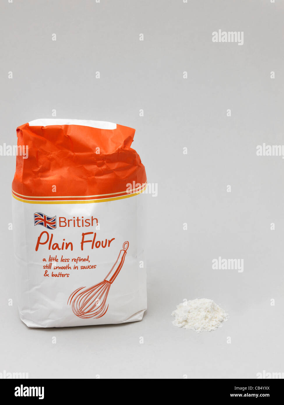 A Pack Of Plain Flour With A Mound Of Flour Next To It Stock Photo - Alamy
