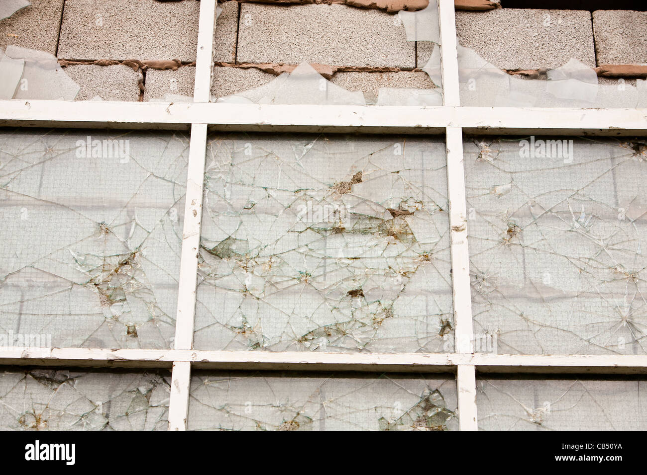 A window smashed by vandals in an old cotton mill in Burnley ...