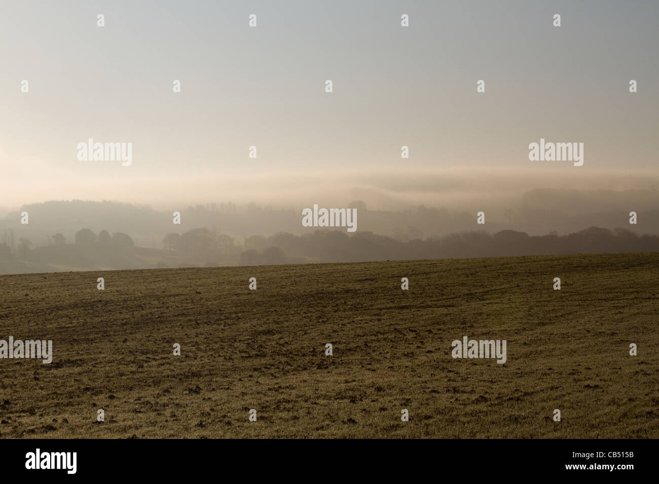 Morning mist over farmland Stock Photo - Alamy