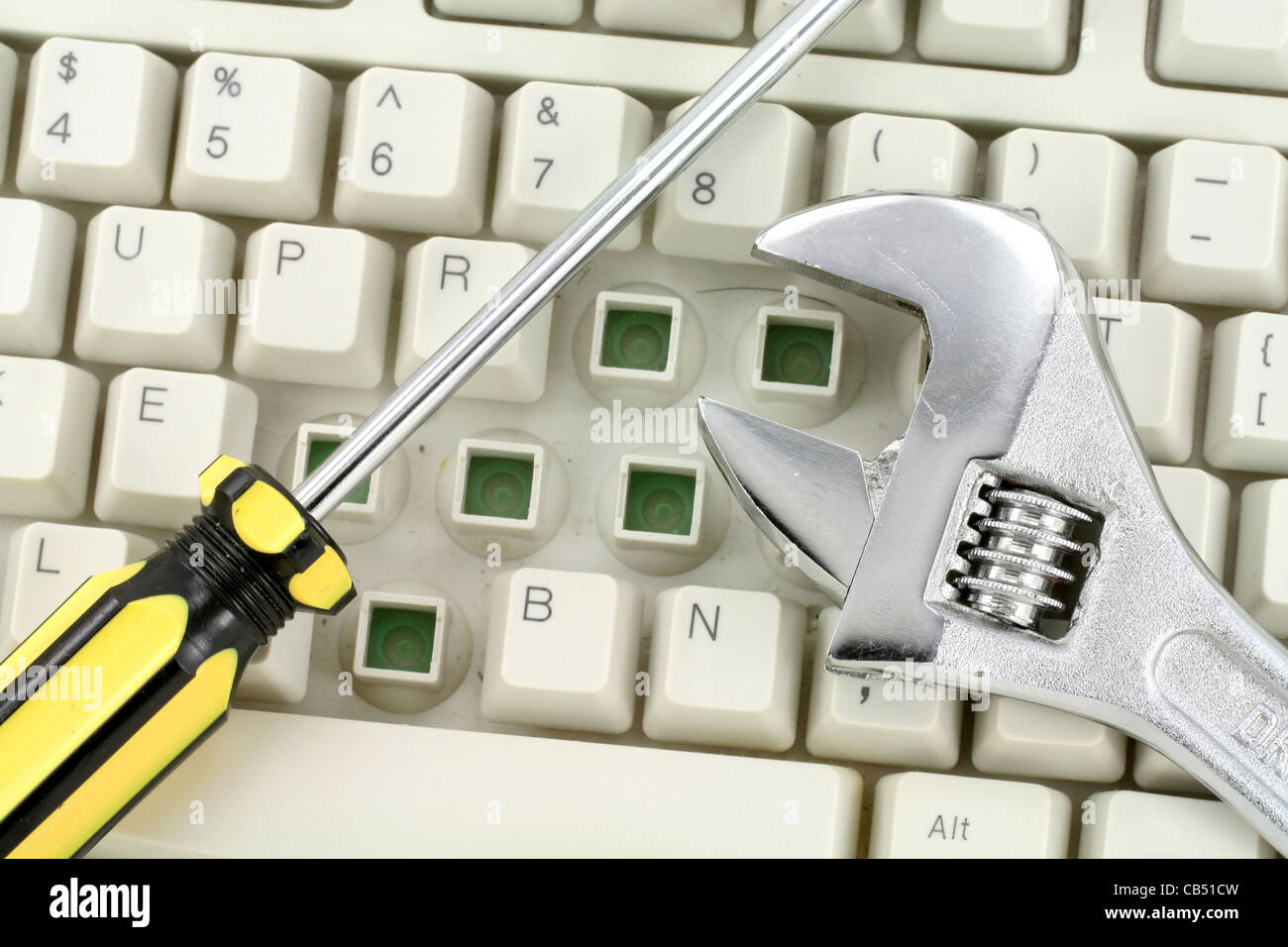 Adjustable Wrench and keyboard, concept of computer repairing Stock ...