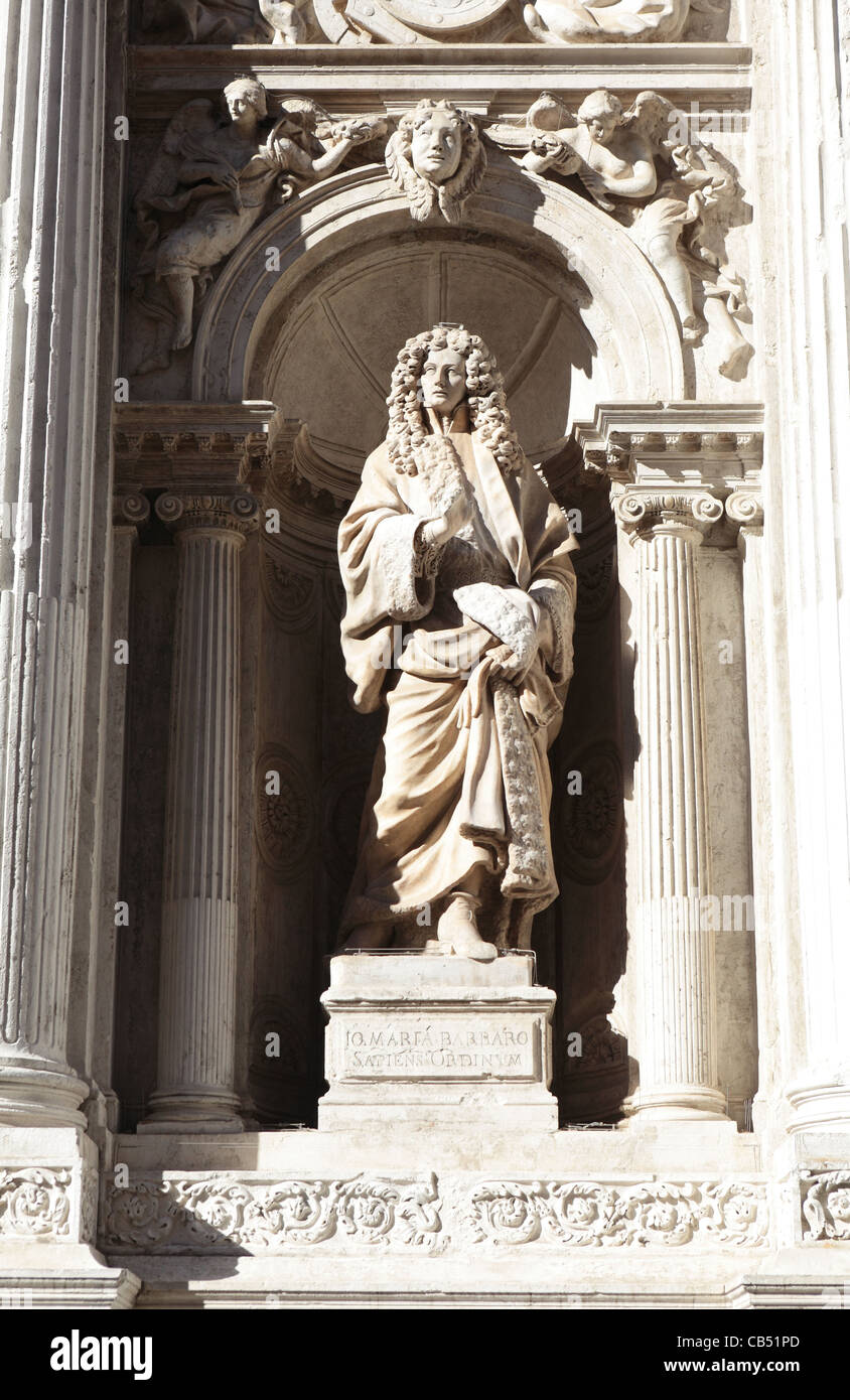 A statue of a member of the Barbaro family on the outside of Chiesa di ...