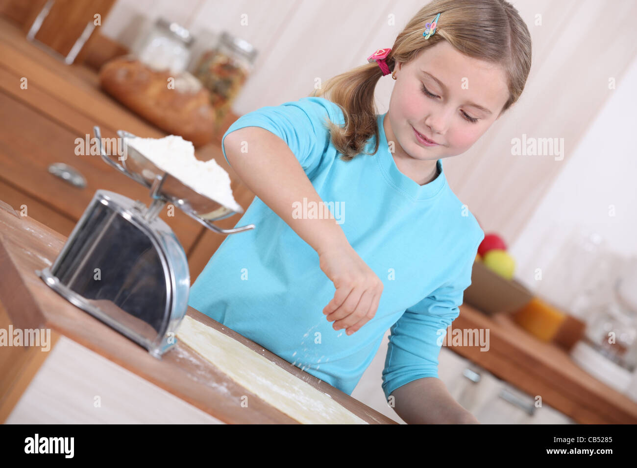 little girl making pancakes Stock Photo - Alamy