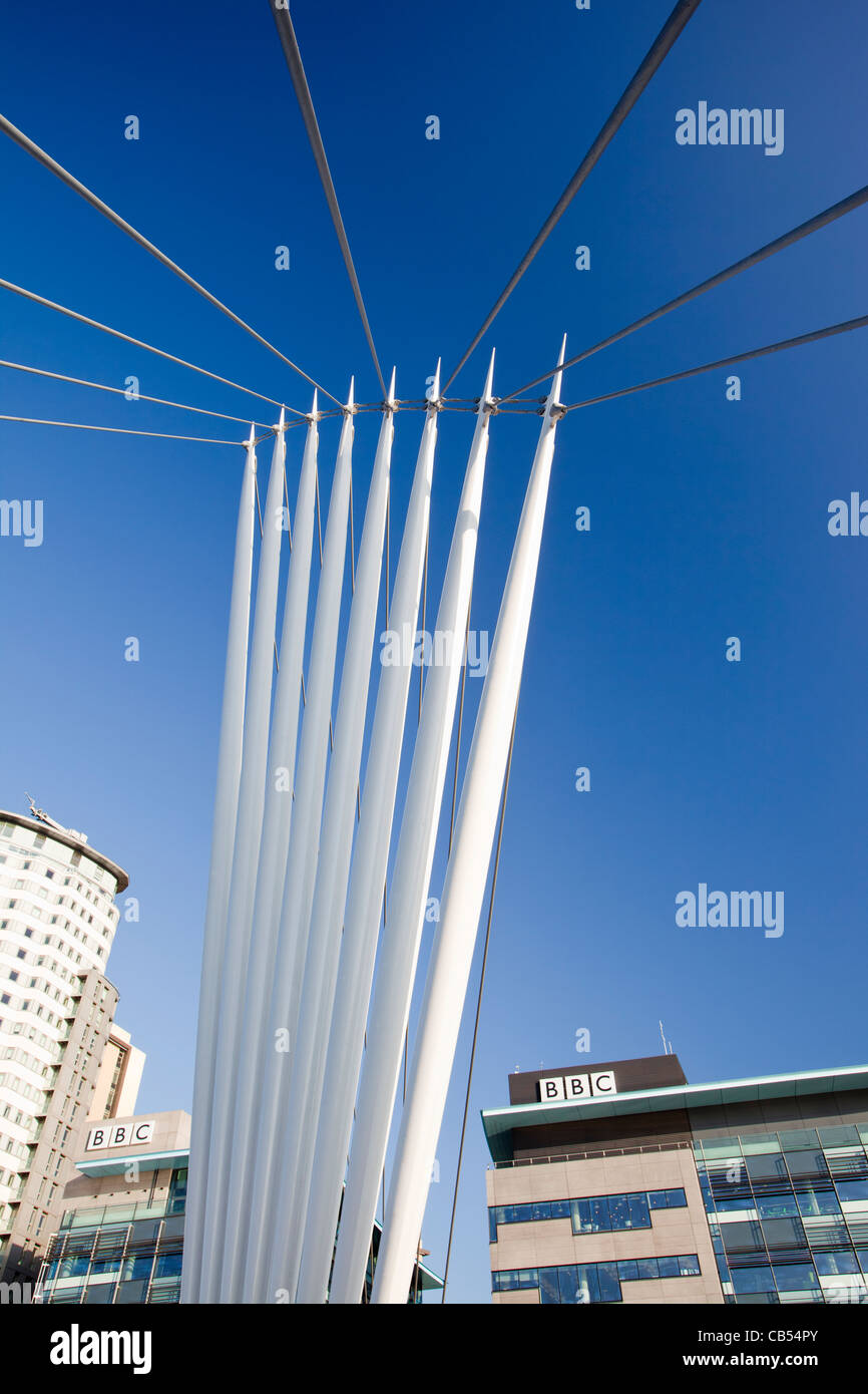 A modern pedestrian suspension bridge over the Manchester ship Canal at ...