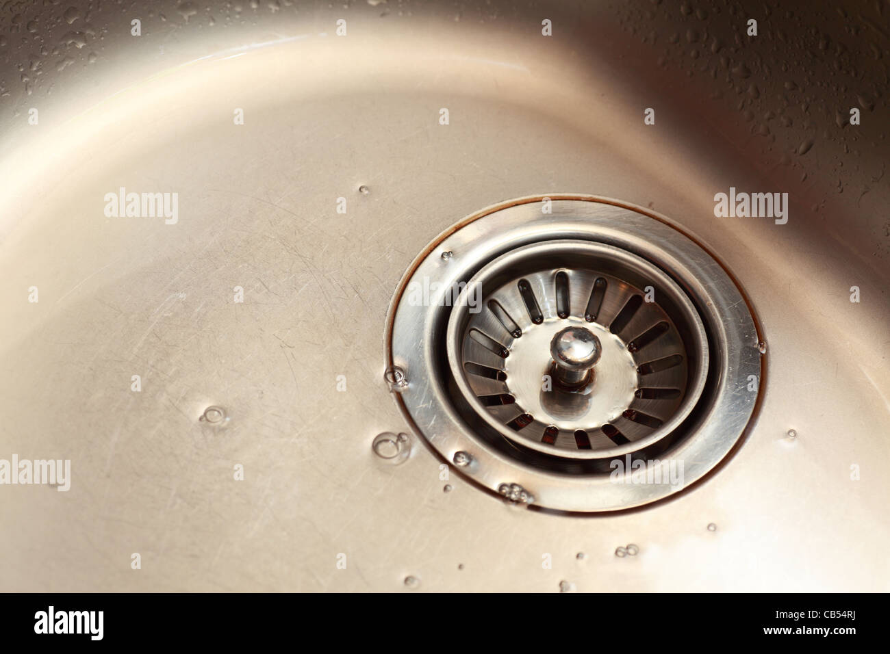 Stainless steel kitchen sink background Stock Photo - Alamy