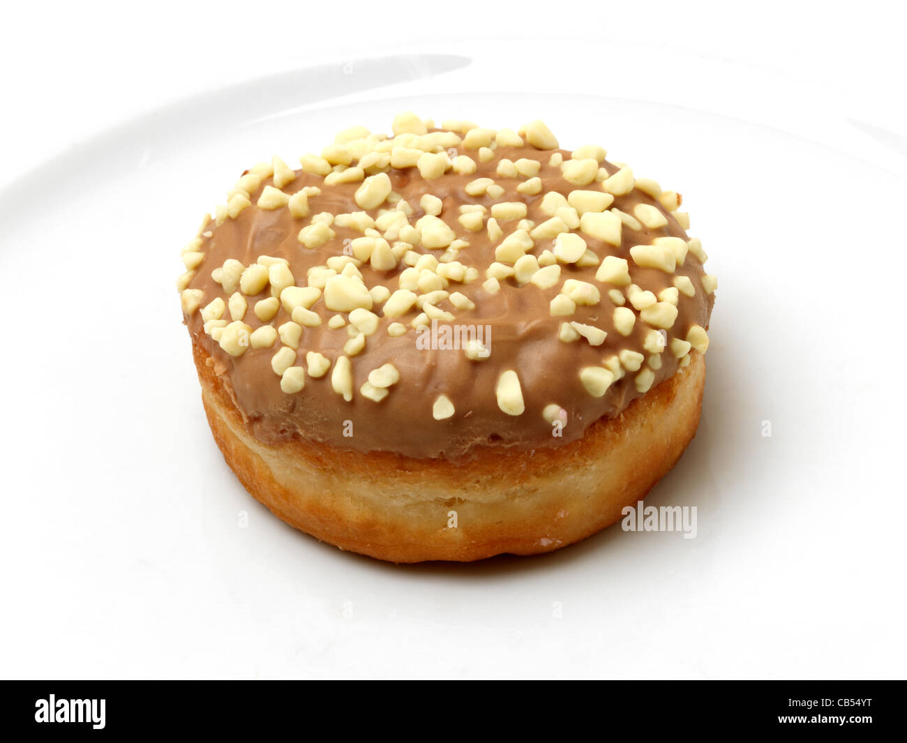 Doughnut With Toffee Icing And Sprinkles Stock Photo - Alamy