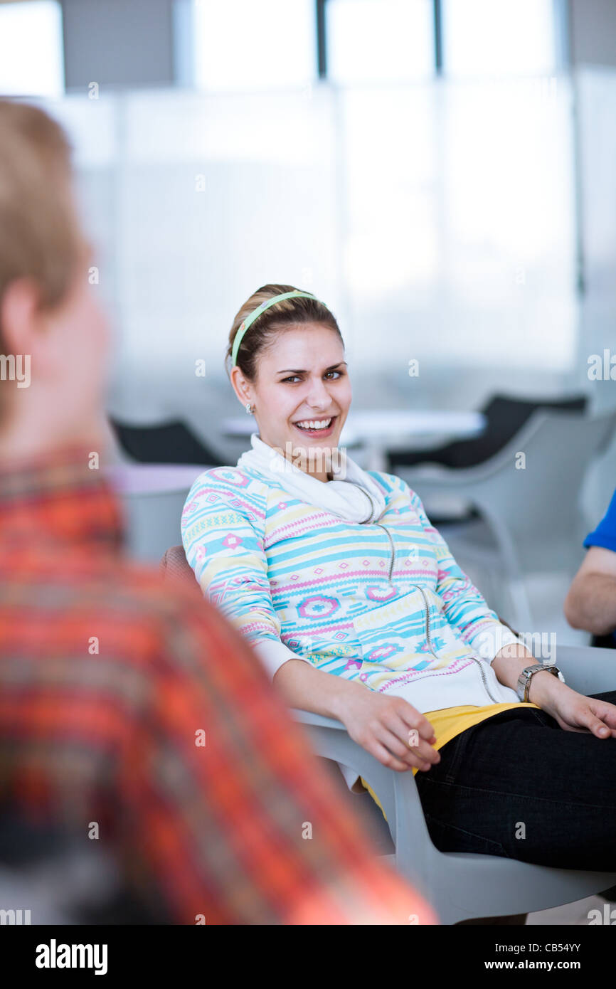 Group of college/university students during a brake Stock Photo - Alamy