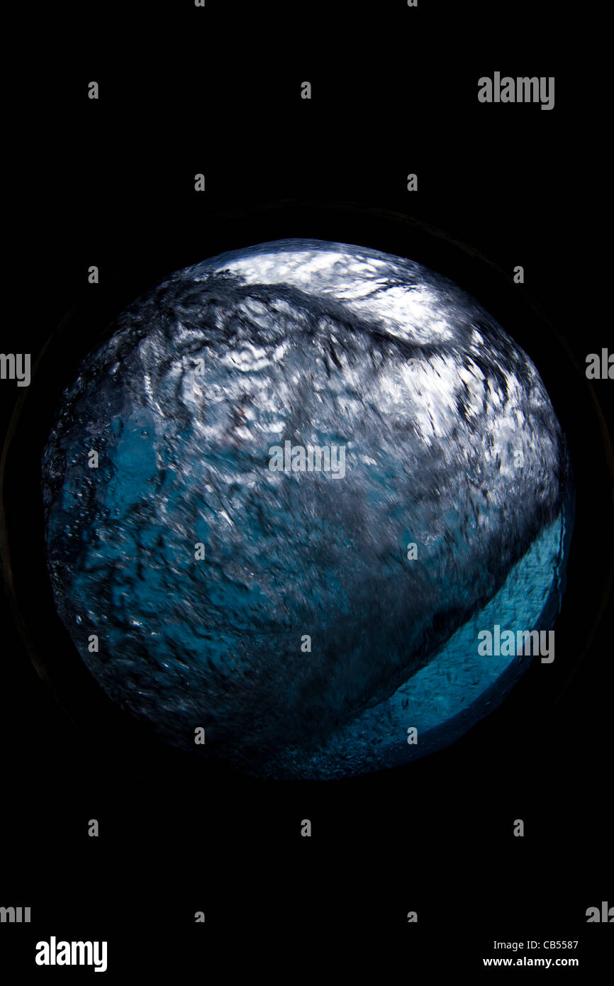 galapagos water port hole speed ocean wash round Stock Photo - Alamy