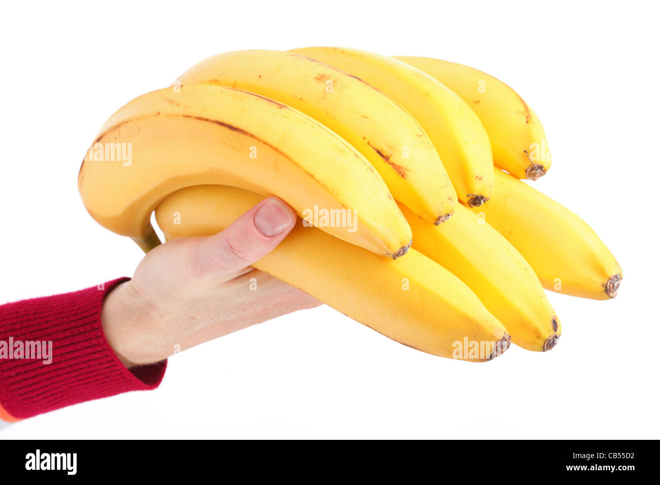 yellow bunch bananas in woman hand isolated on white background Stock ...