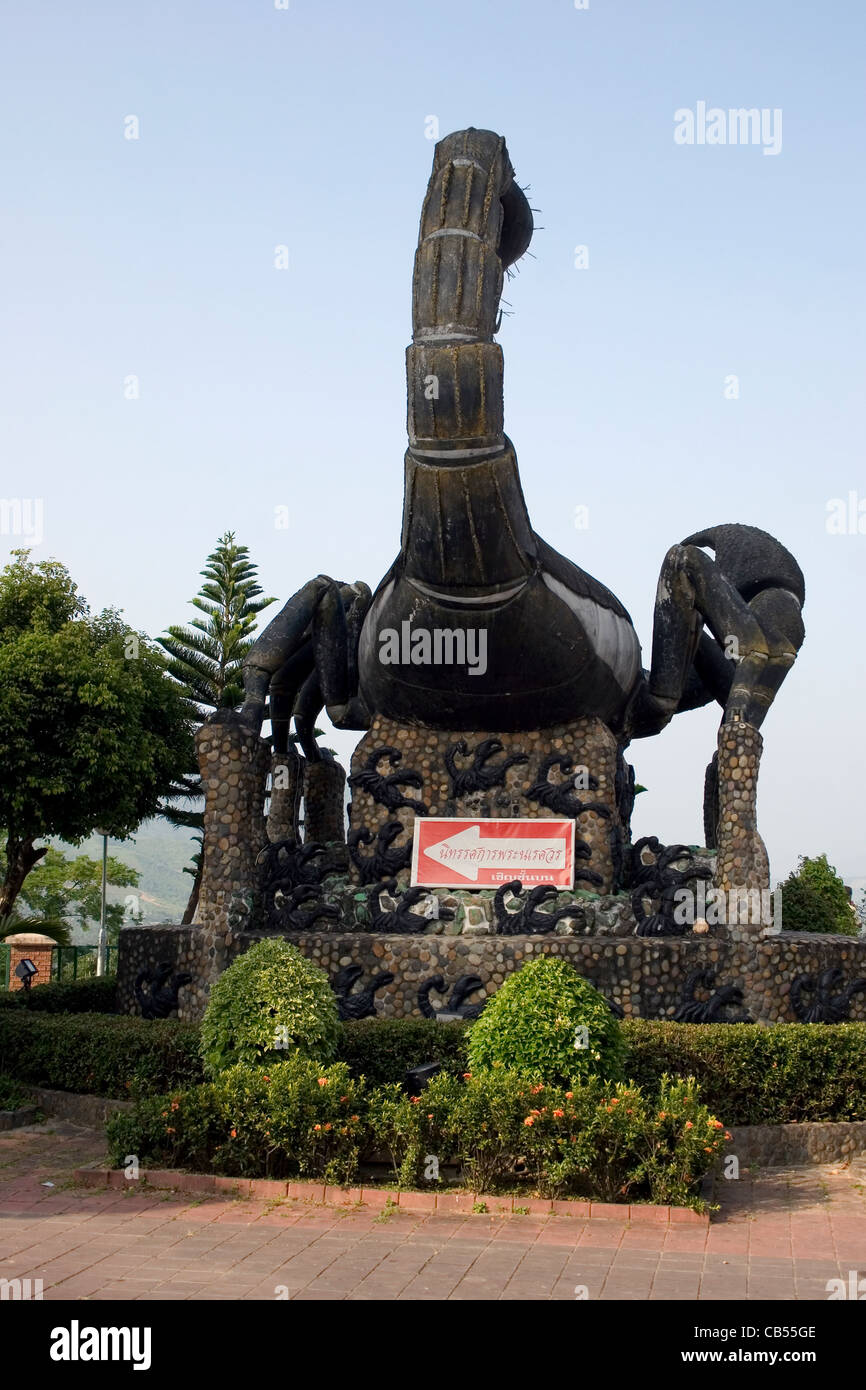 A large and elaborate scorpion statue decorates the beautiful Wat Phra ...