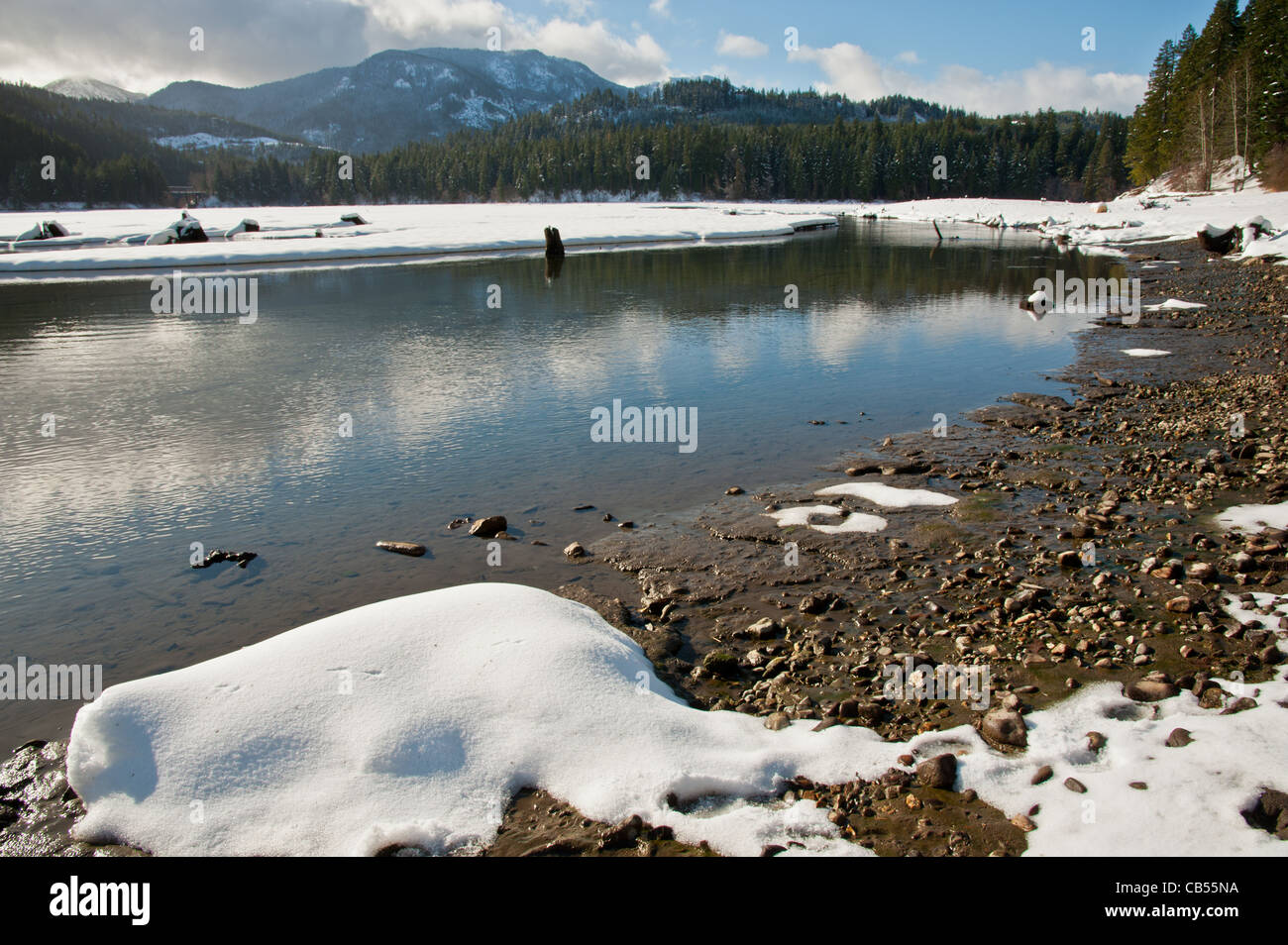 Snow lake in a sunny winter day Stock Photo - Alamy
