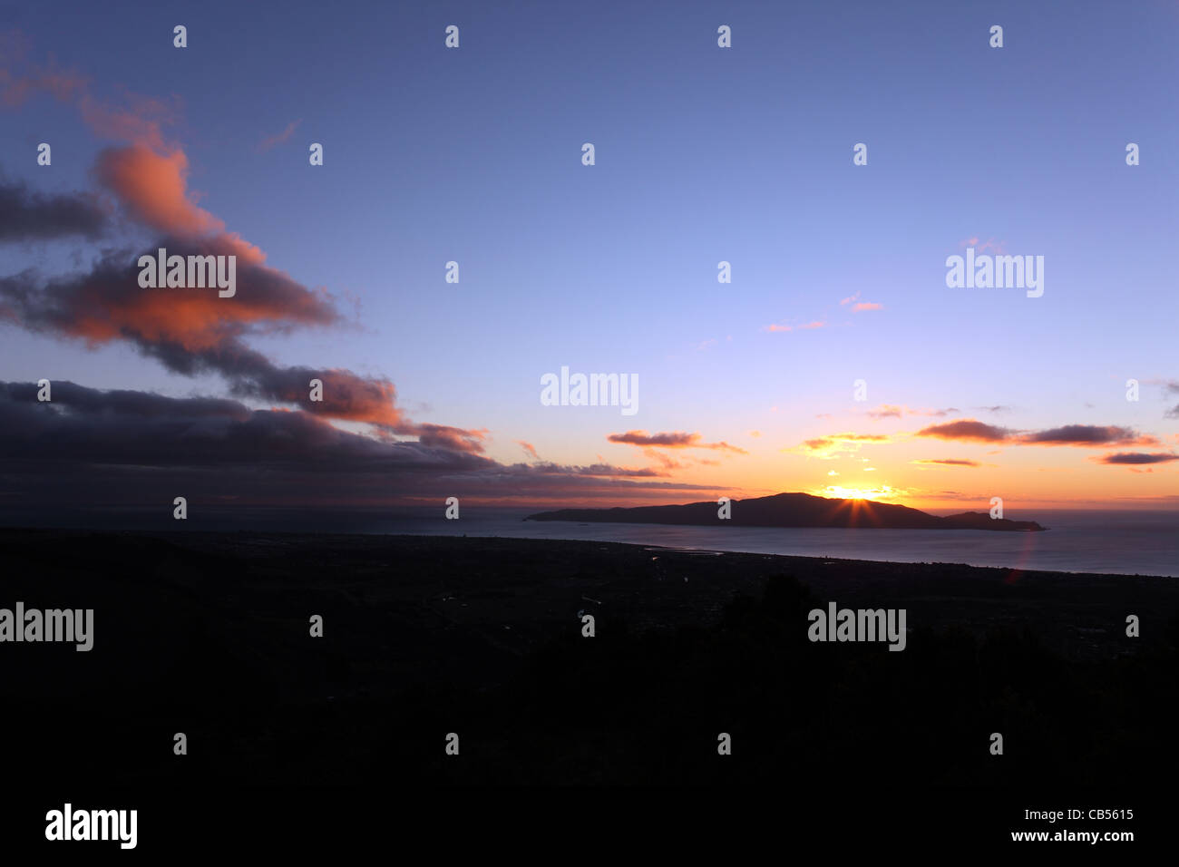 Sunset over Kapiti Island from Waikane Beach. Kapiti Island, Waikanae ...