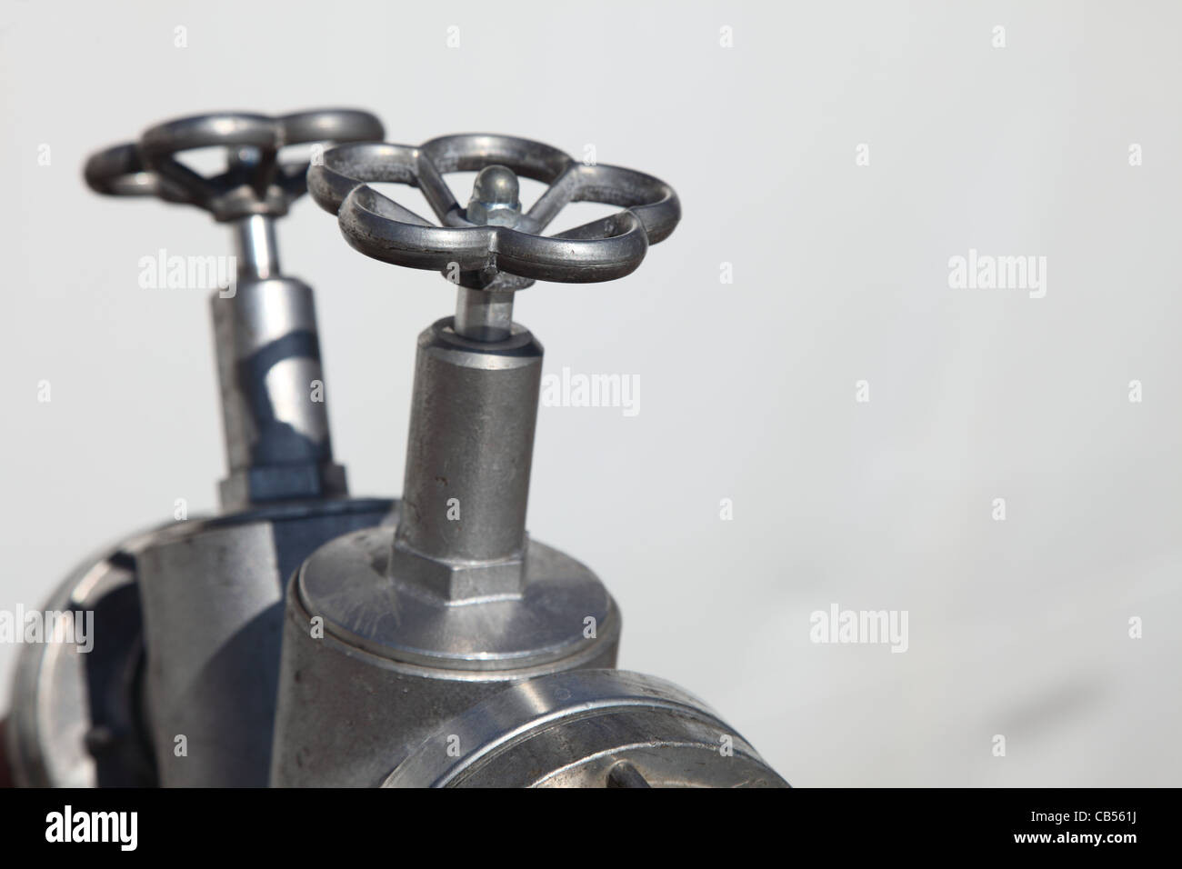 Water valve from a metal hydrant Stock Photo - Alamy