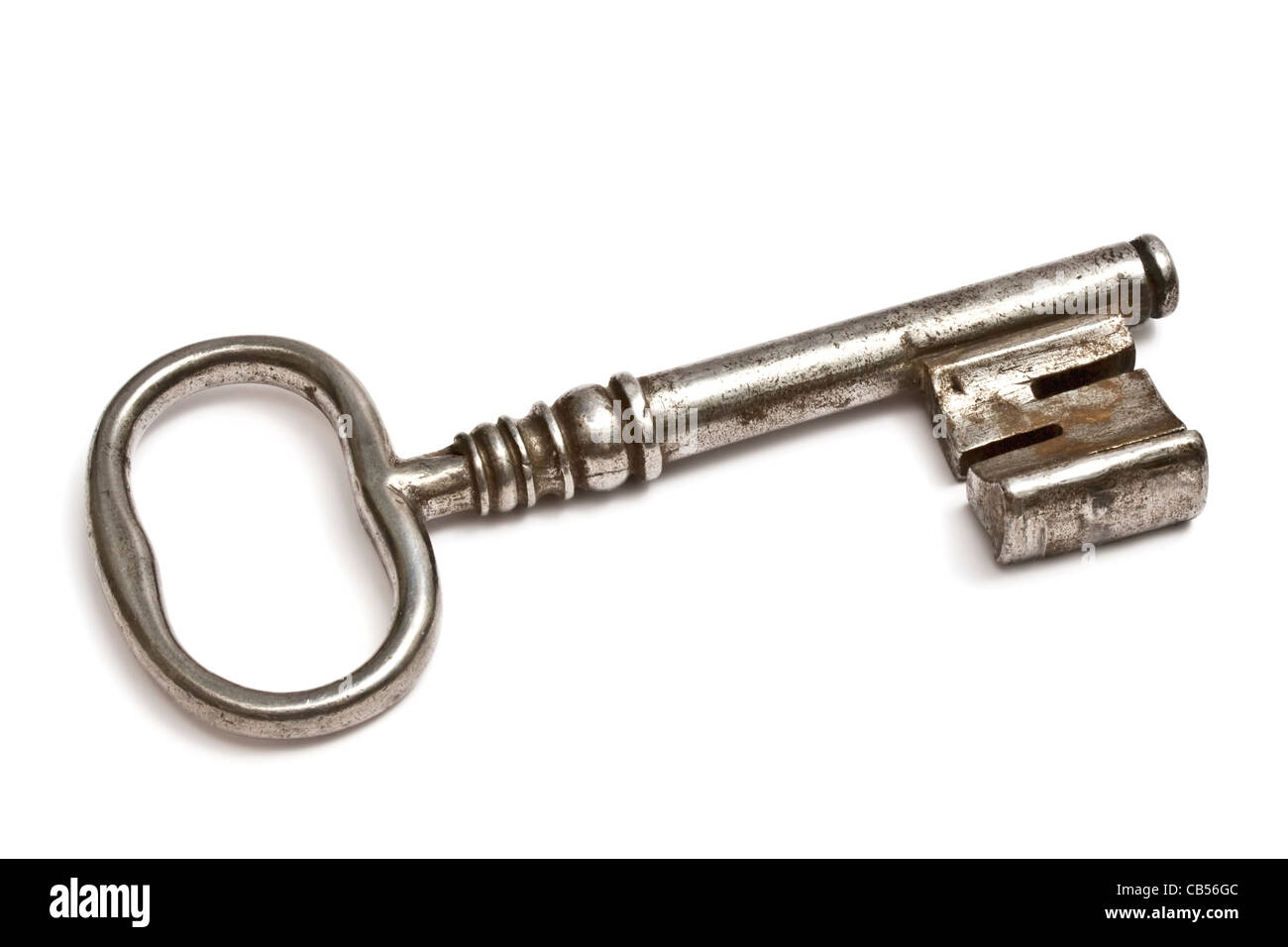 Old key isolated on white background Stock Photo - Alamy