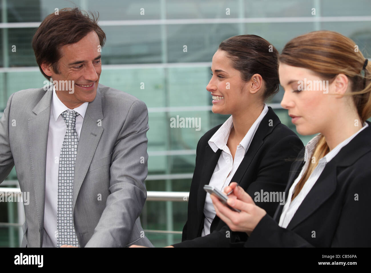 Business people stood outside building hi-res stock photography and ...