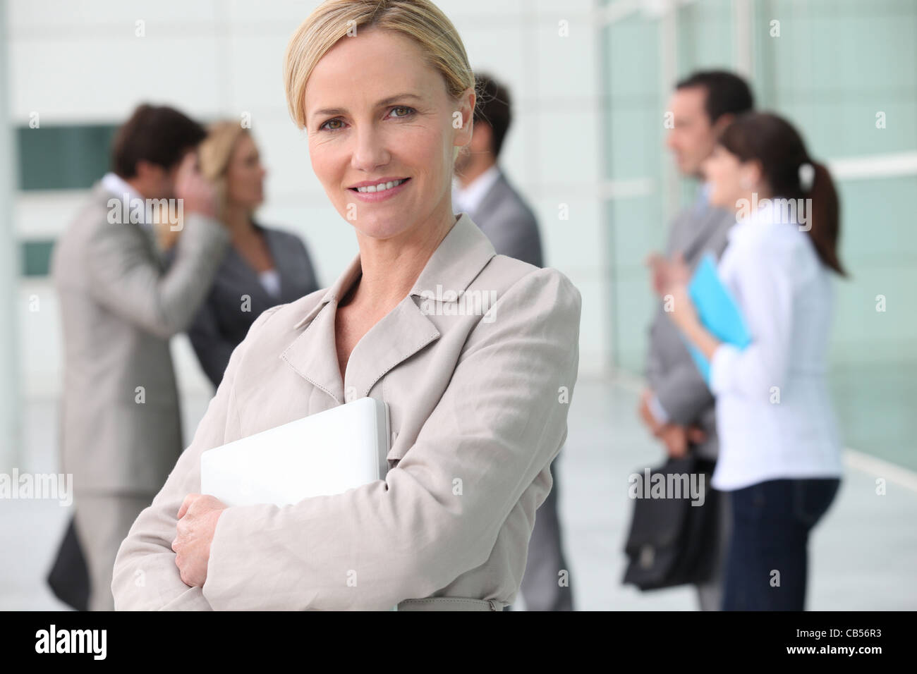 Woman leaving work Stock Photo - Alamy