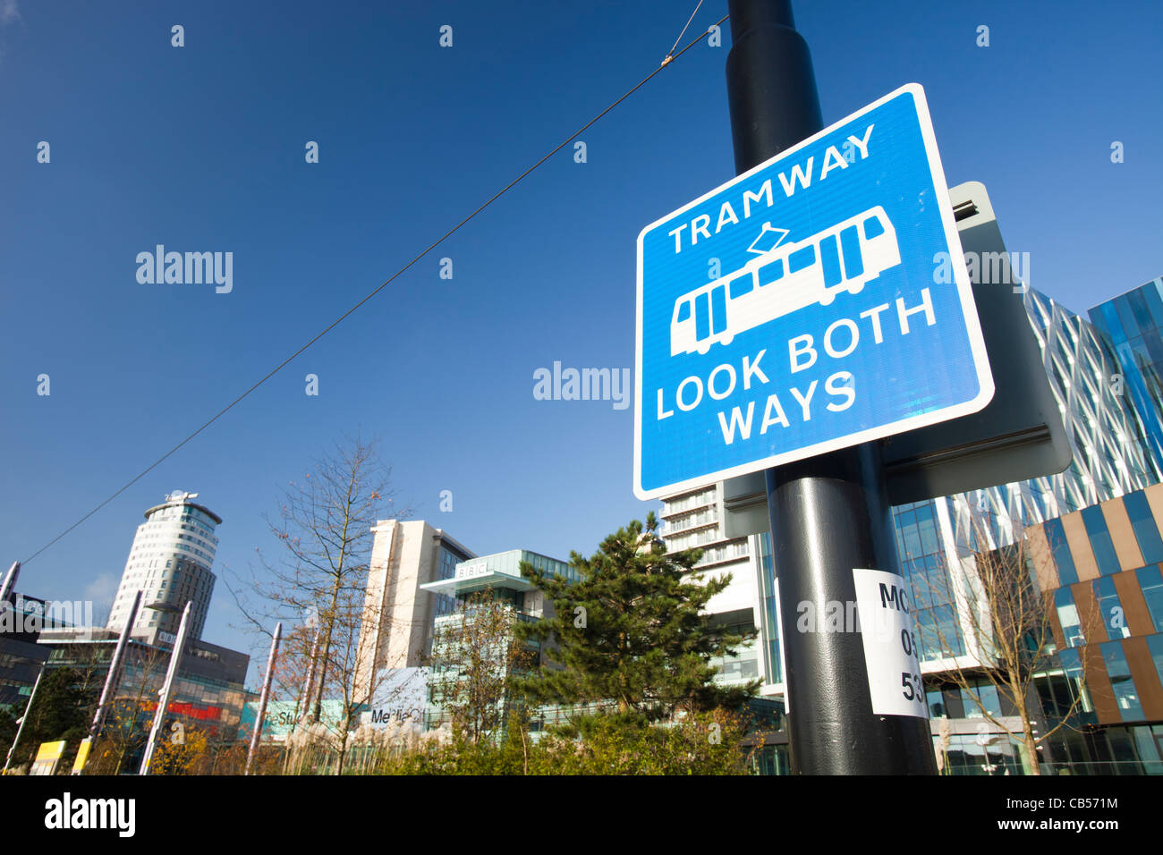 A tram warning sign at Media City , Salford Quays, Manchester, UK Stock ...