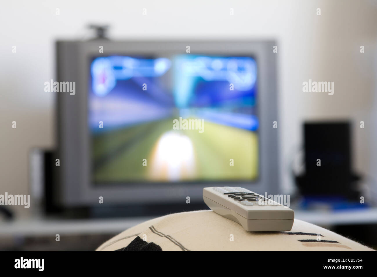 a remote control pointing to a TV Stock Photo - Alamy