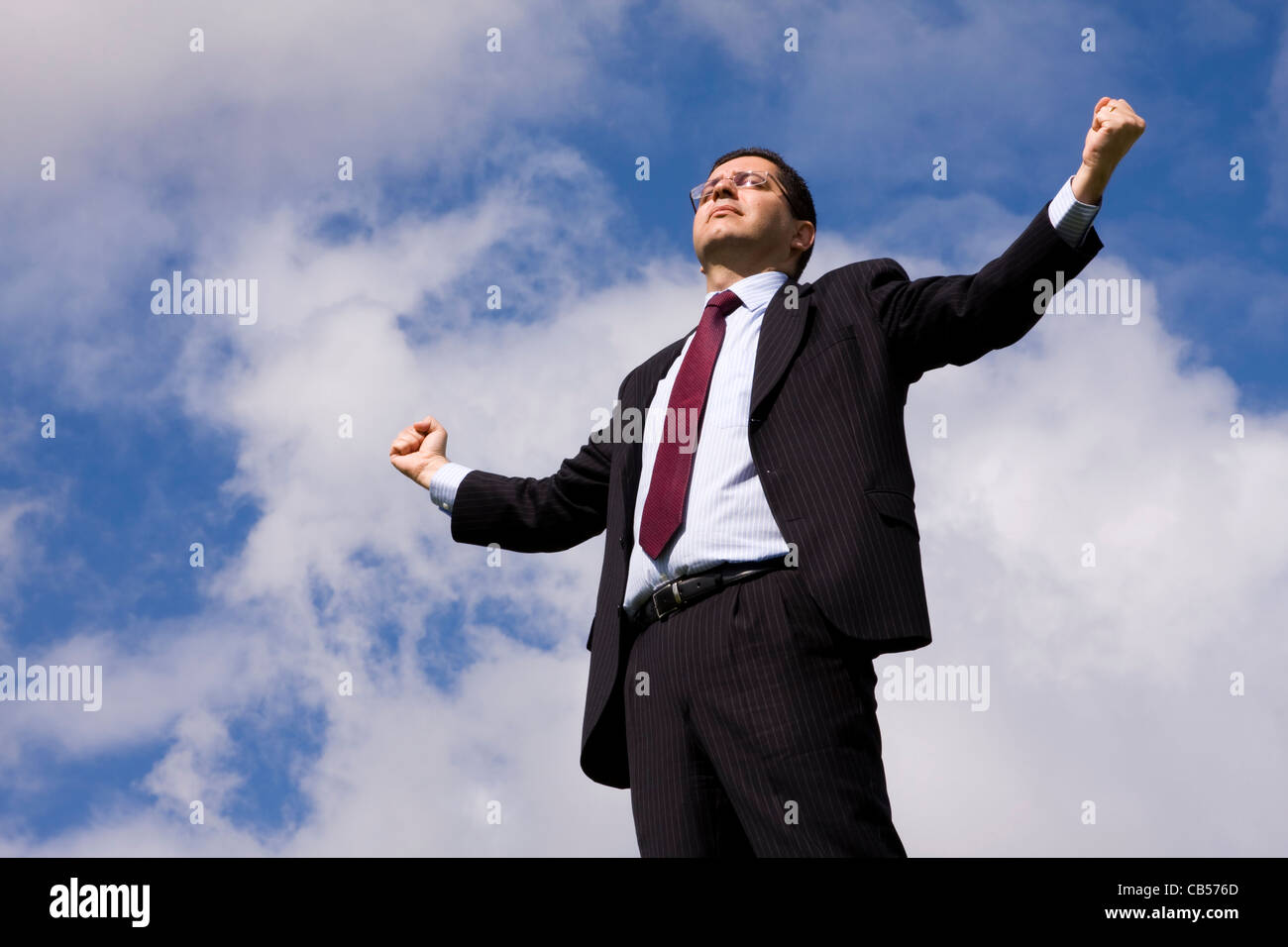 a successful businessman showing his moment of victory Stock Photo - Alamy