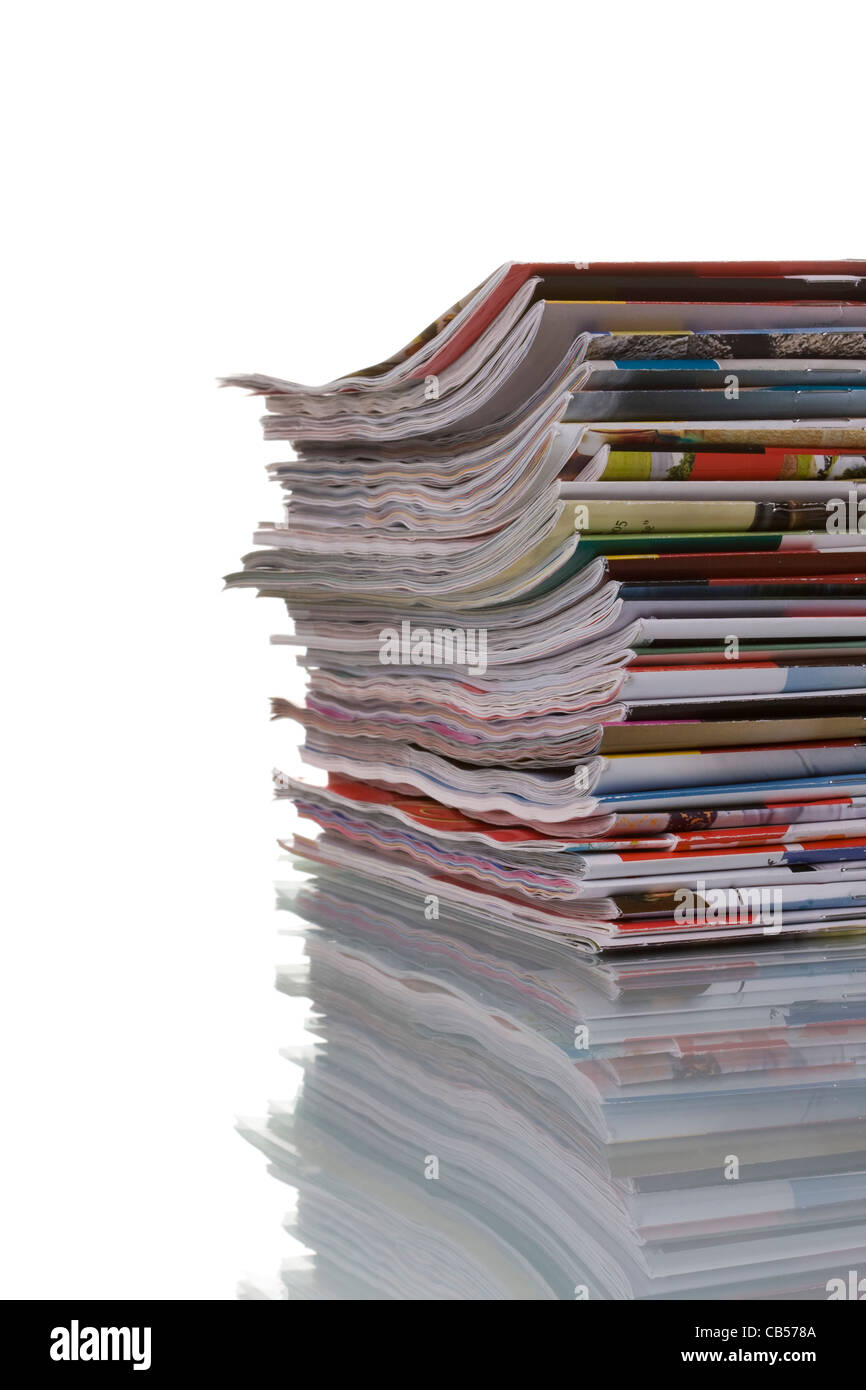 Stack of magazines isolated on white with reflection Stock Photo - Alamy