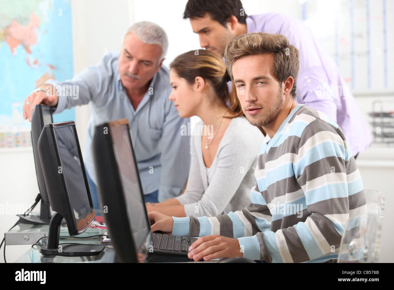 People working on computers Stock Photo - Alamy
